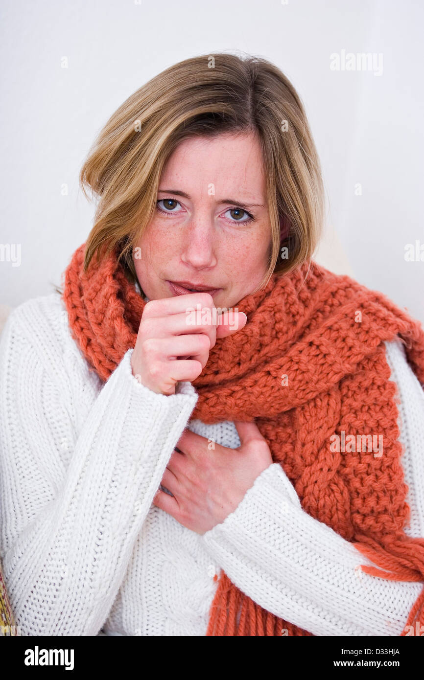 Woman is coughing Stock Photo - Alamy