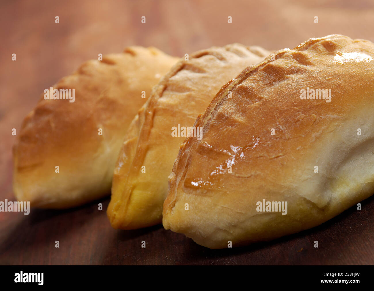 pierogi .Home cake with jam against the wooden table Stock Photo - Alamy