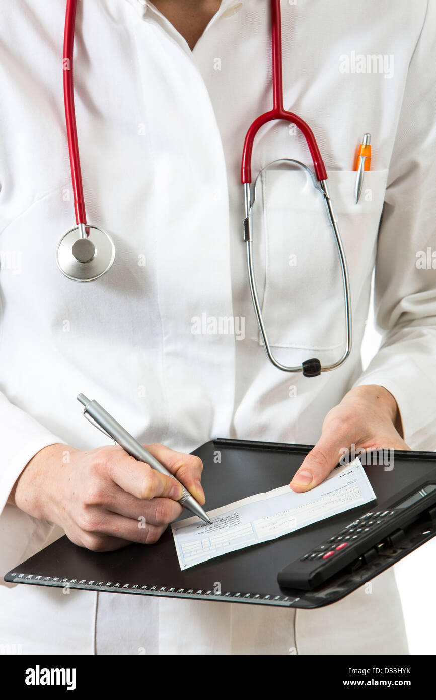 Doctor signs a prescription medication. Symbolic image medicine Stock ...