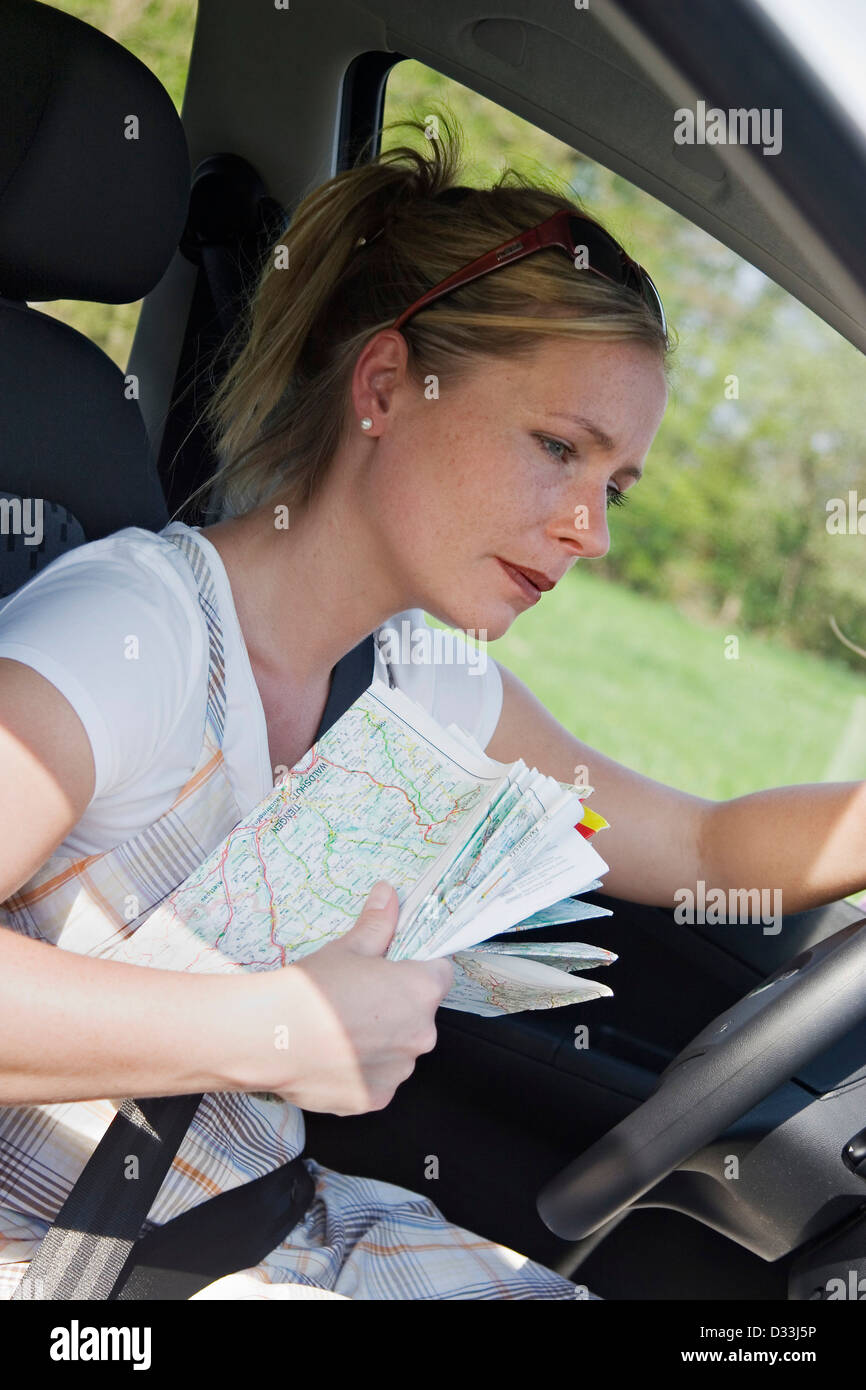 Woman fanning herself in the heat hi-res stock photography and images ...