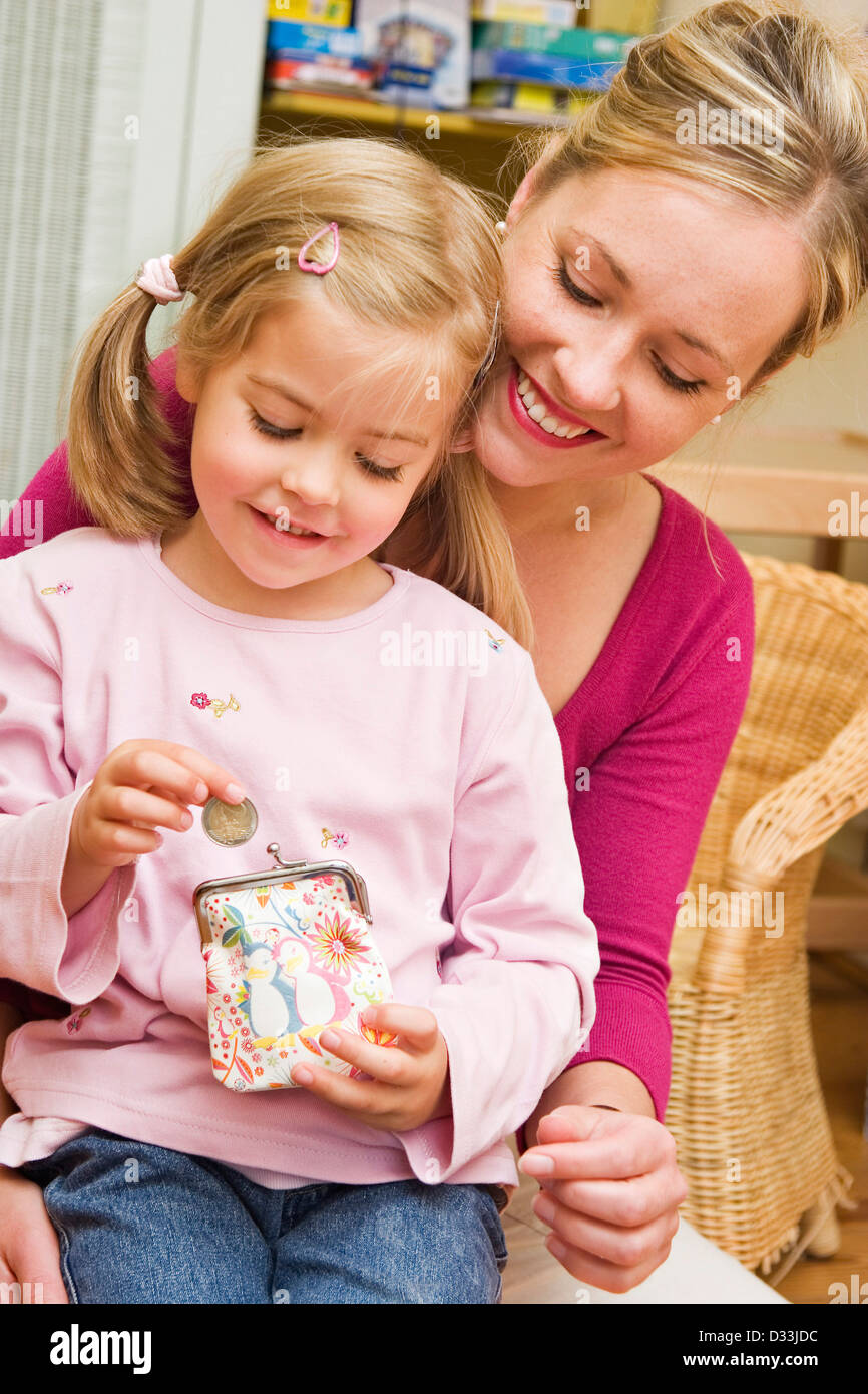 Child spending pocket money hi-res stock photography and images - Alamy