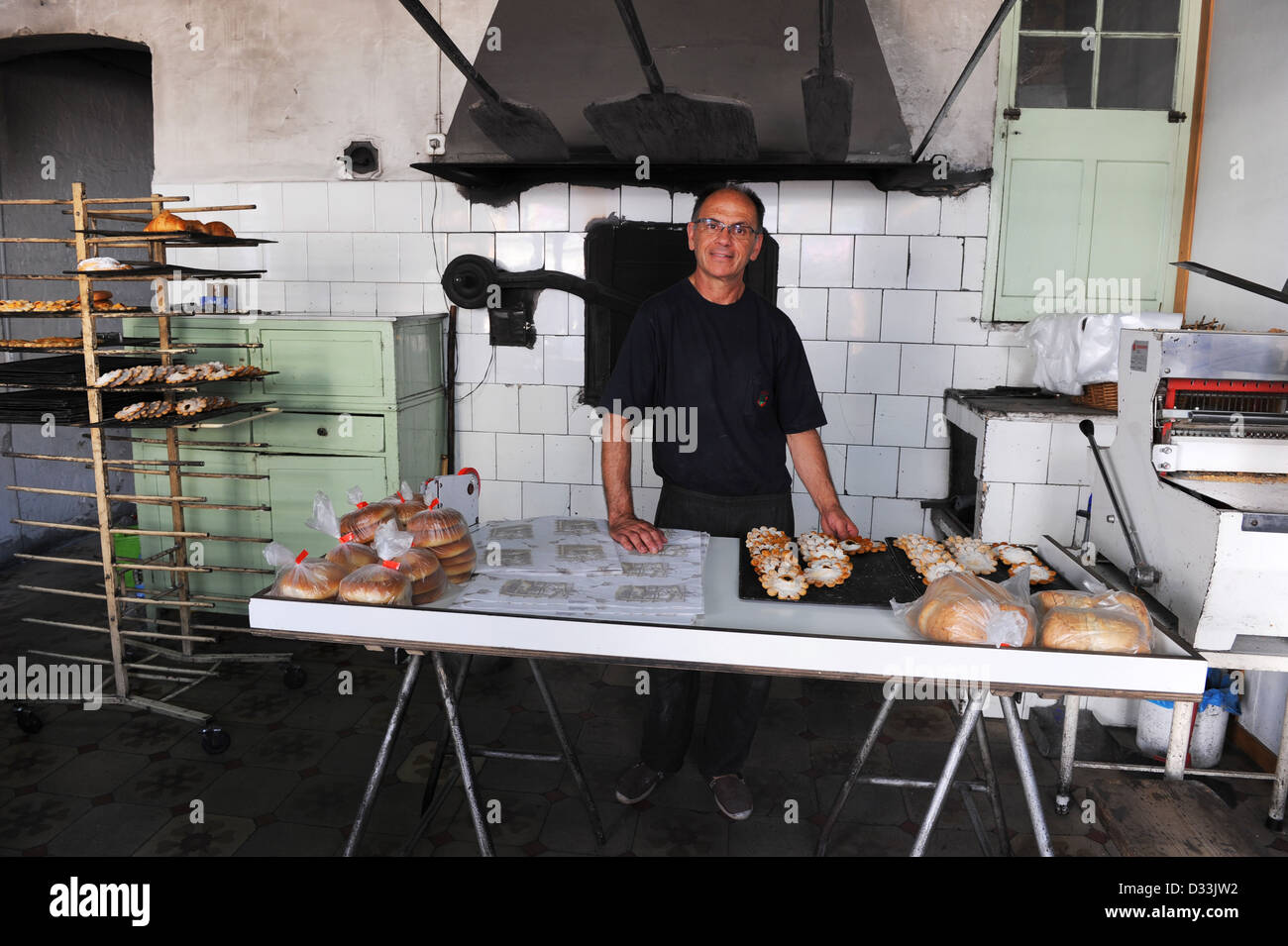 Baker Juan Olives Morro, of Sant Climent, Menorca, with freshly baked ...