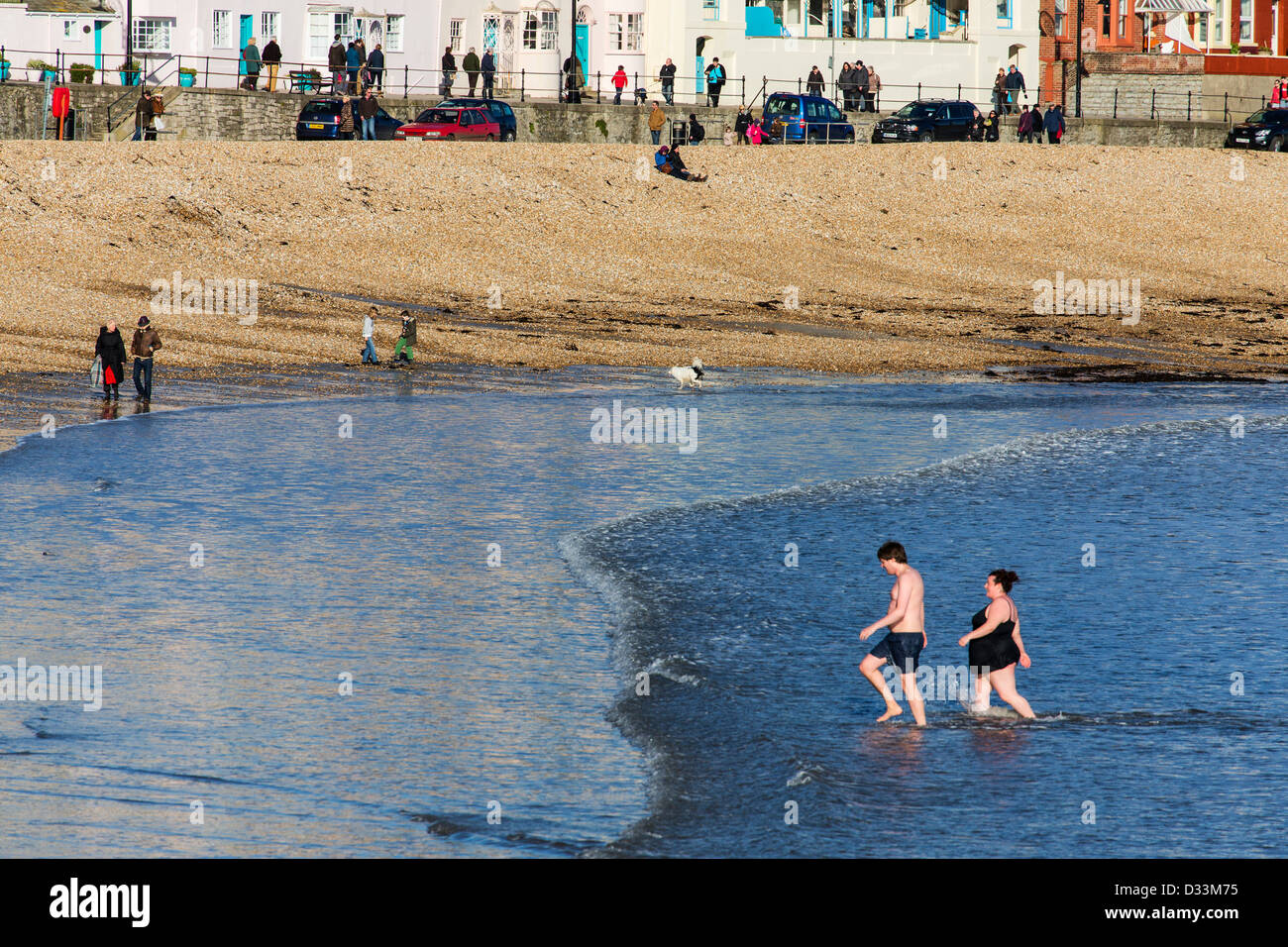 People taking a winter swim, Lyme Regis, Dorset, England Stock Photo ...