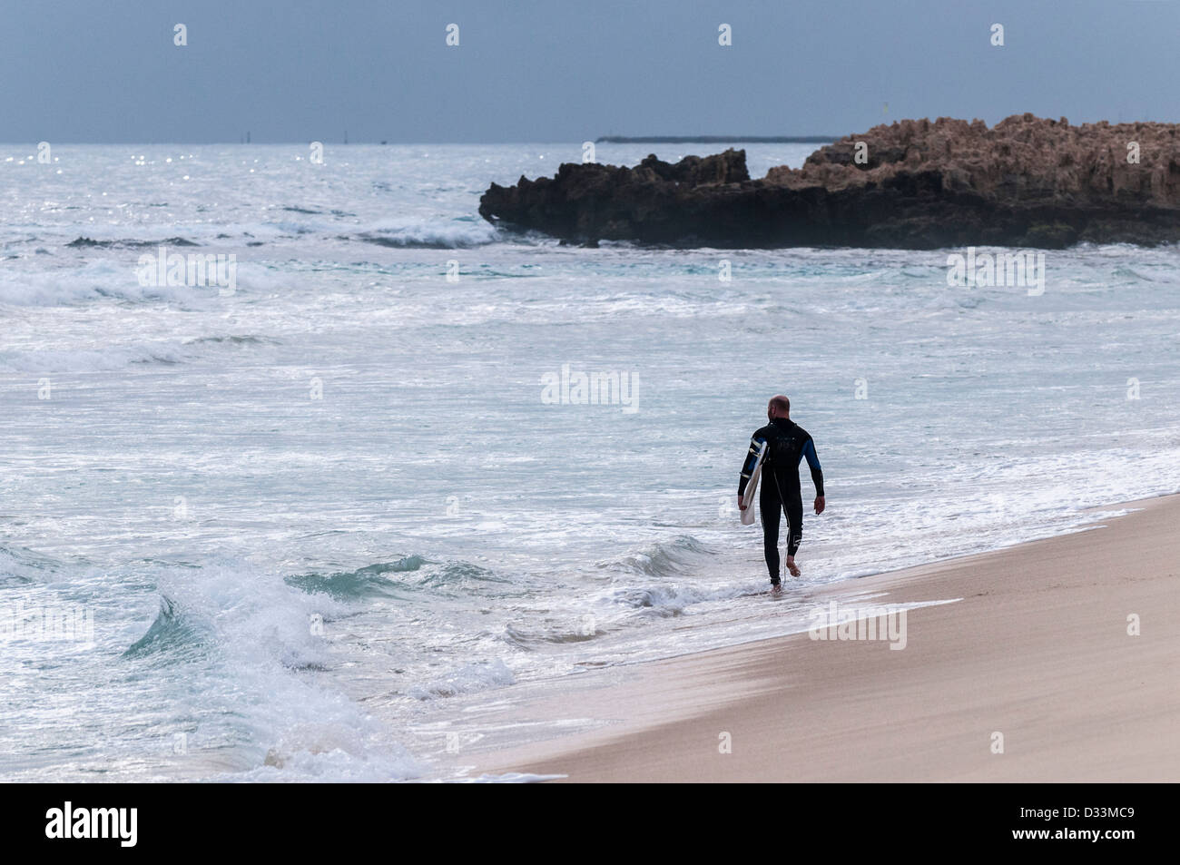 Trigg Beach, Perth, Western Australia - with surfer in the evening ...