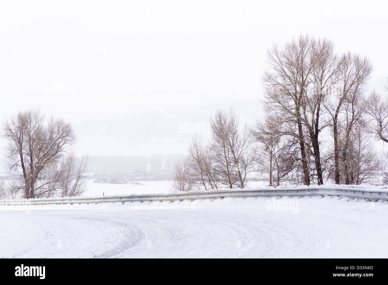 Road covered in snow after winter storm Stock Photo - Alamy