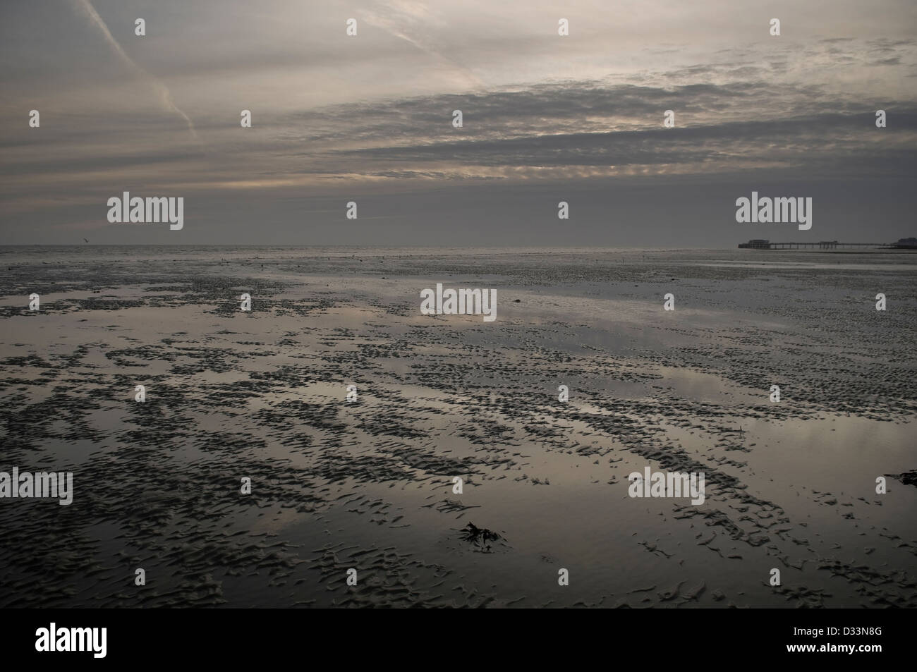 A cold Winters day at low tide on Worthing Beach, West Sussex, UK Stock ...