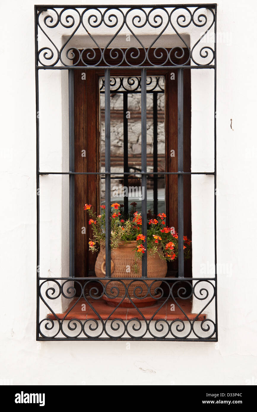 Window decorated with flowers Stock Photo - Alamy