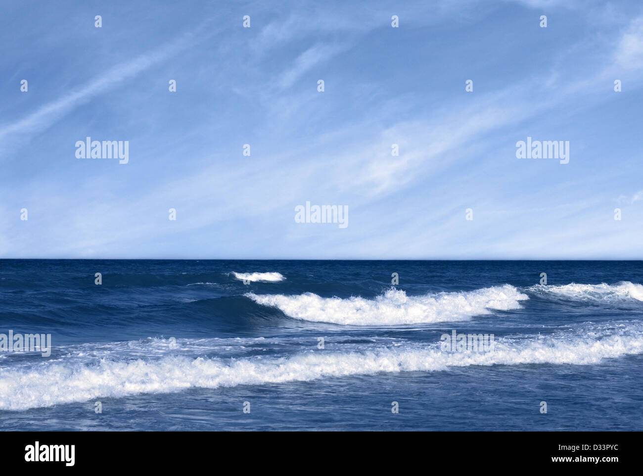 Blue sea with waves and sky Stock Photo - Alamy