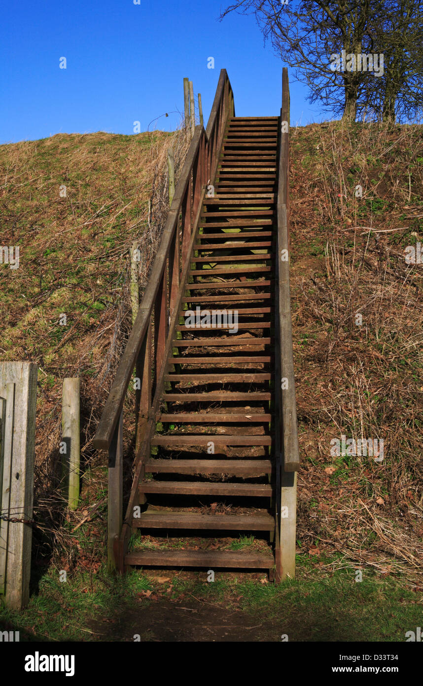 A steep flight of wooden steps up earthworks at the Roman town of Venta ...