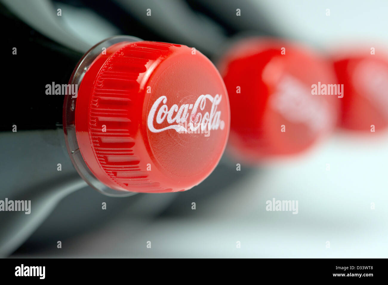 Three bottles of Coca Cola are picutred horizontally in Berlin, Germany ...