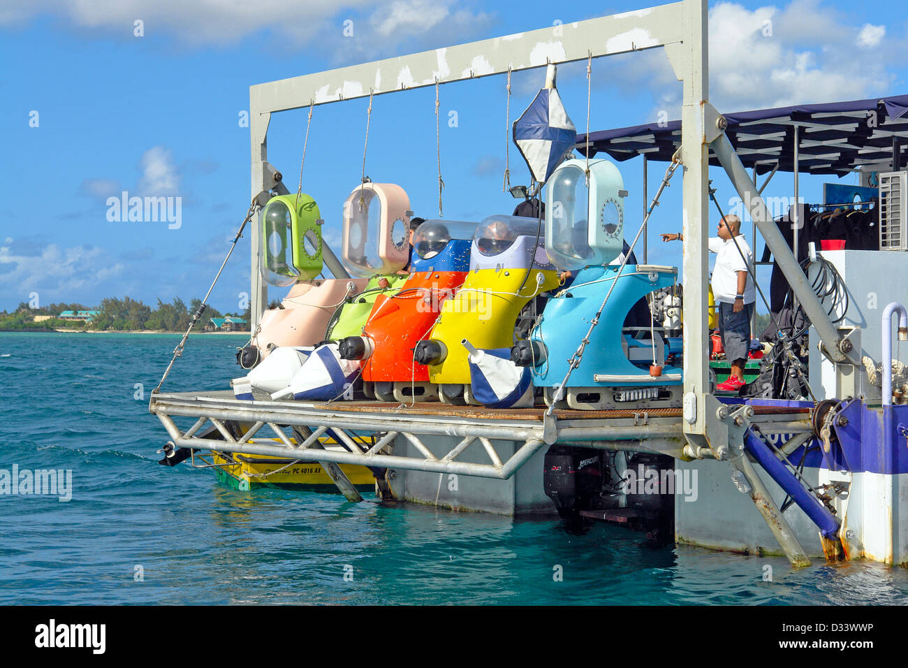 Tourists in underwater scooters ready to be launched from the ...