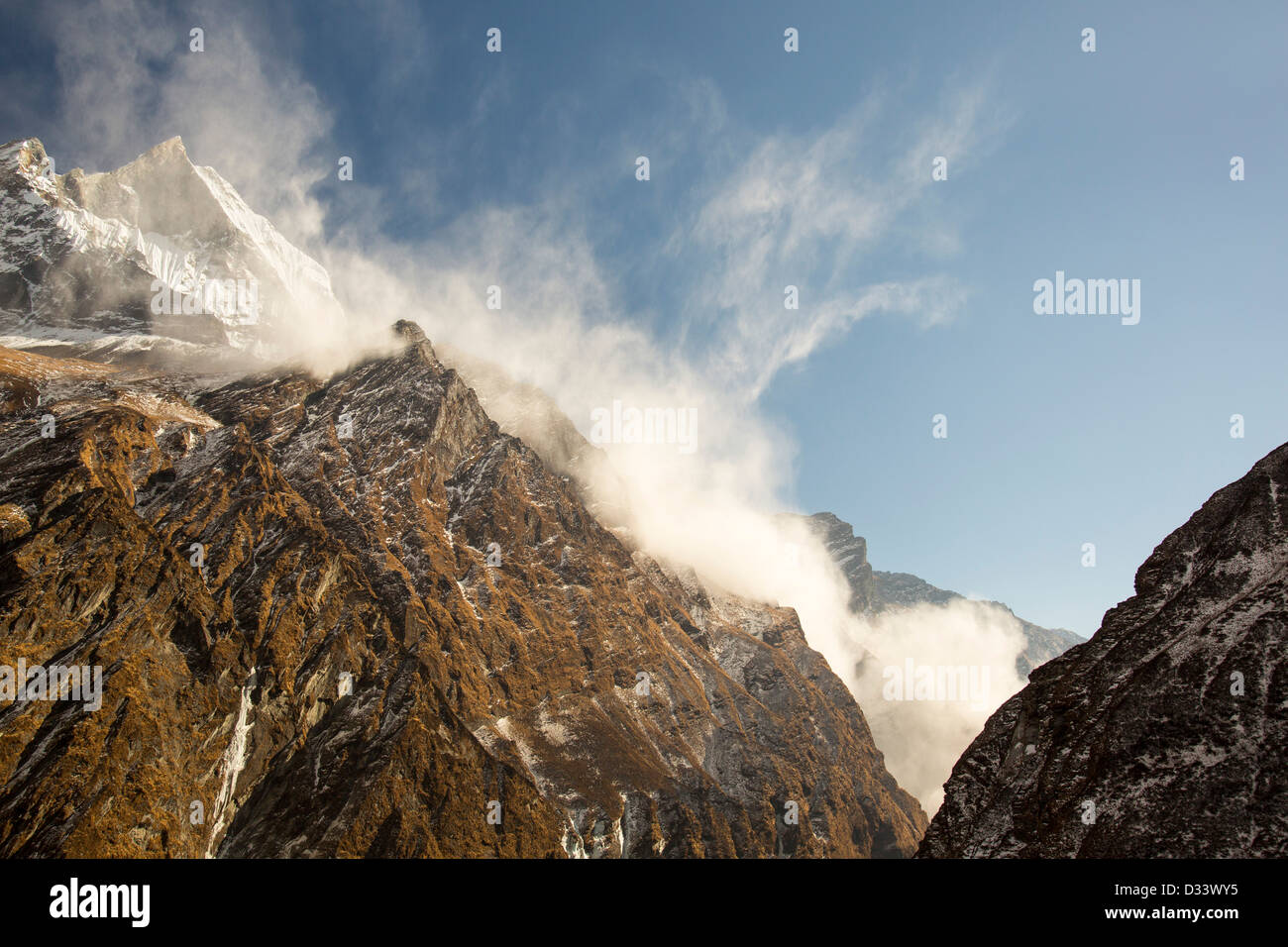 An avalanche on Machapuchare or Fishtail Peak in the Annapurna Himalaya ...