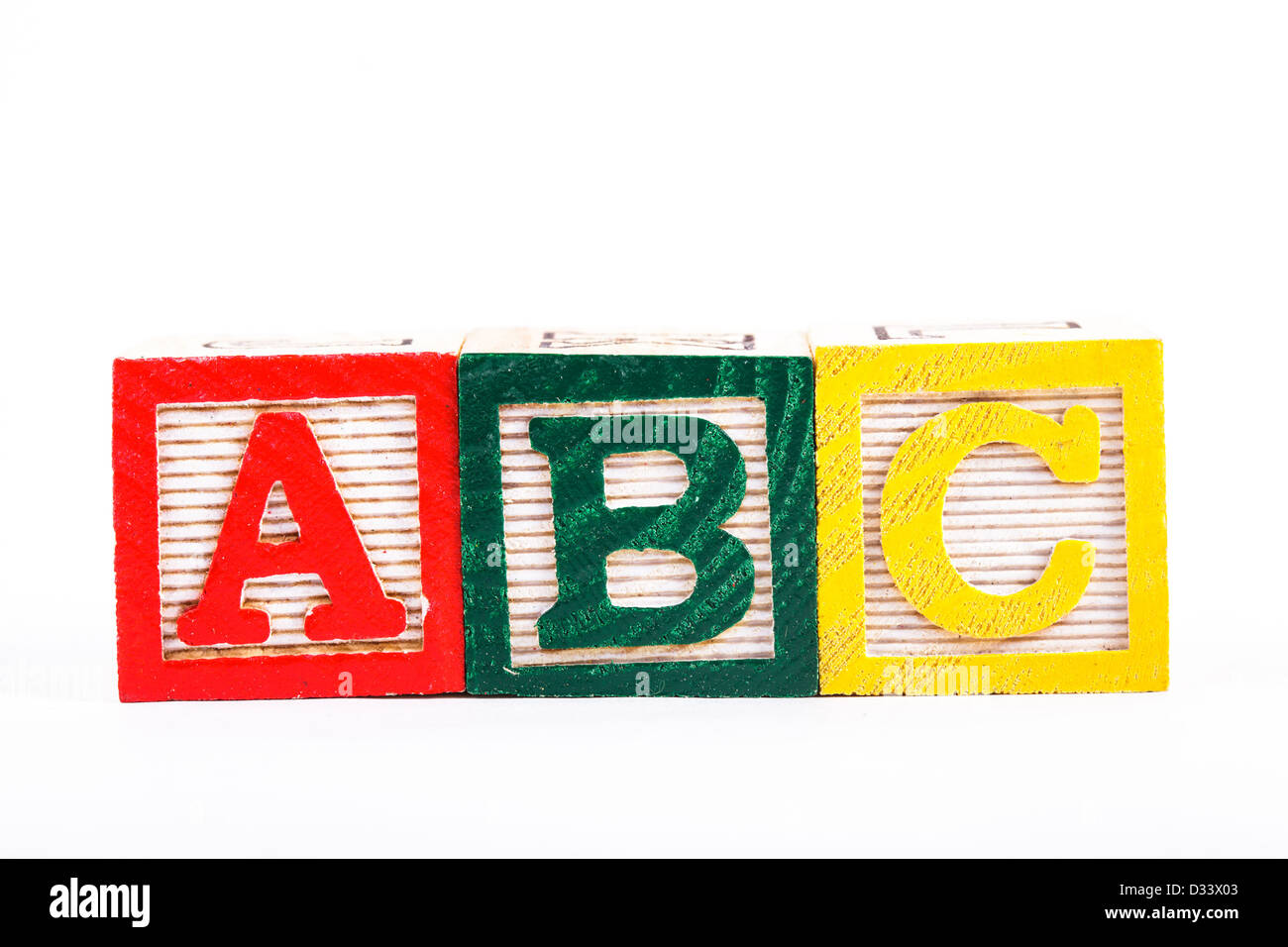 Color wooden alphabet blocks isolated on white Stock Photo - Alamy