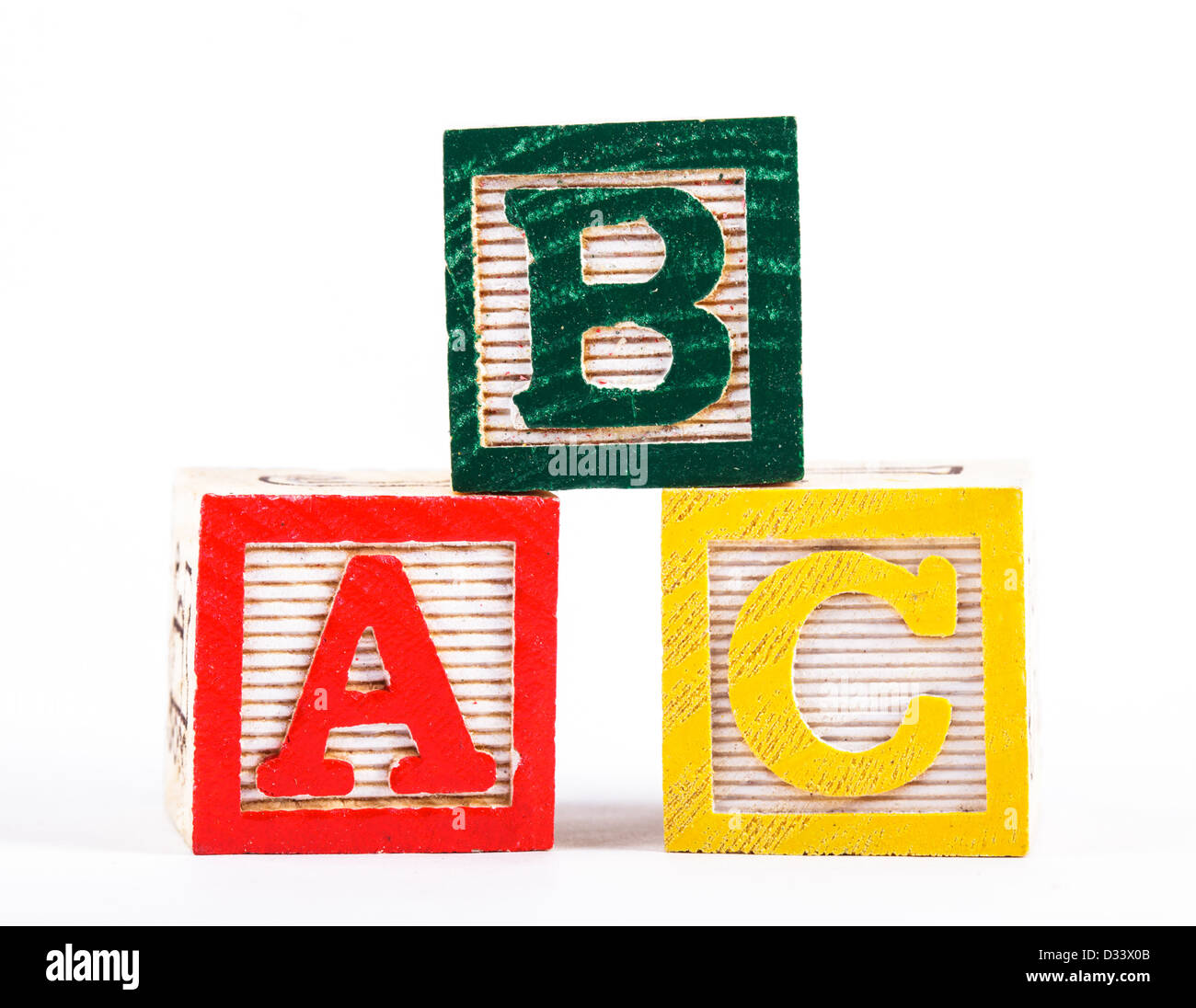 Color wooden alphabet blocks isolated on white Stock Photo - Alamy