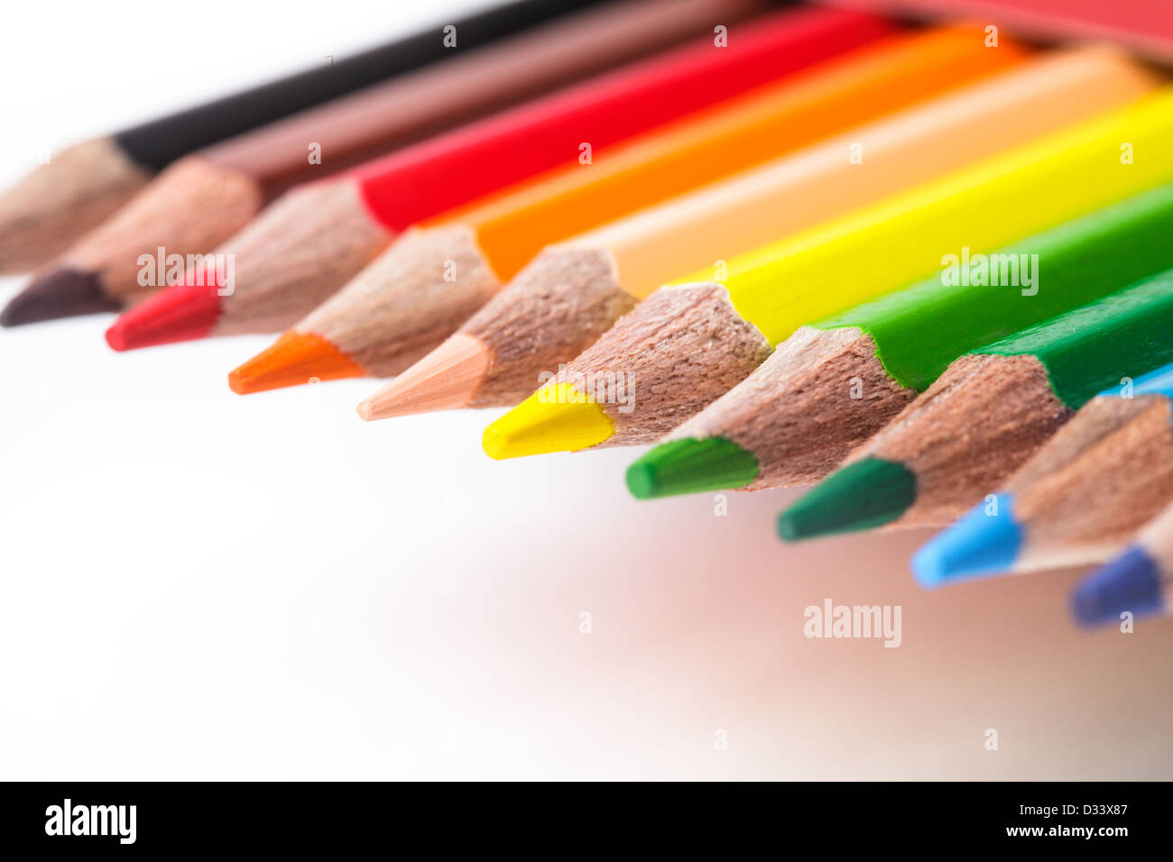 Rainbow color pencils in a row isolated on white Stock Photo - Alamy