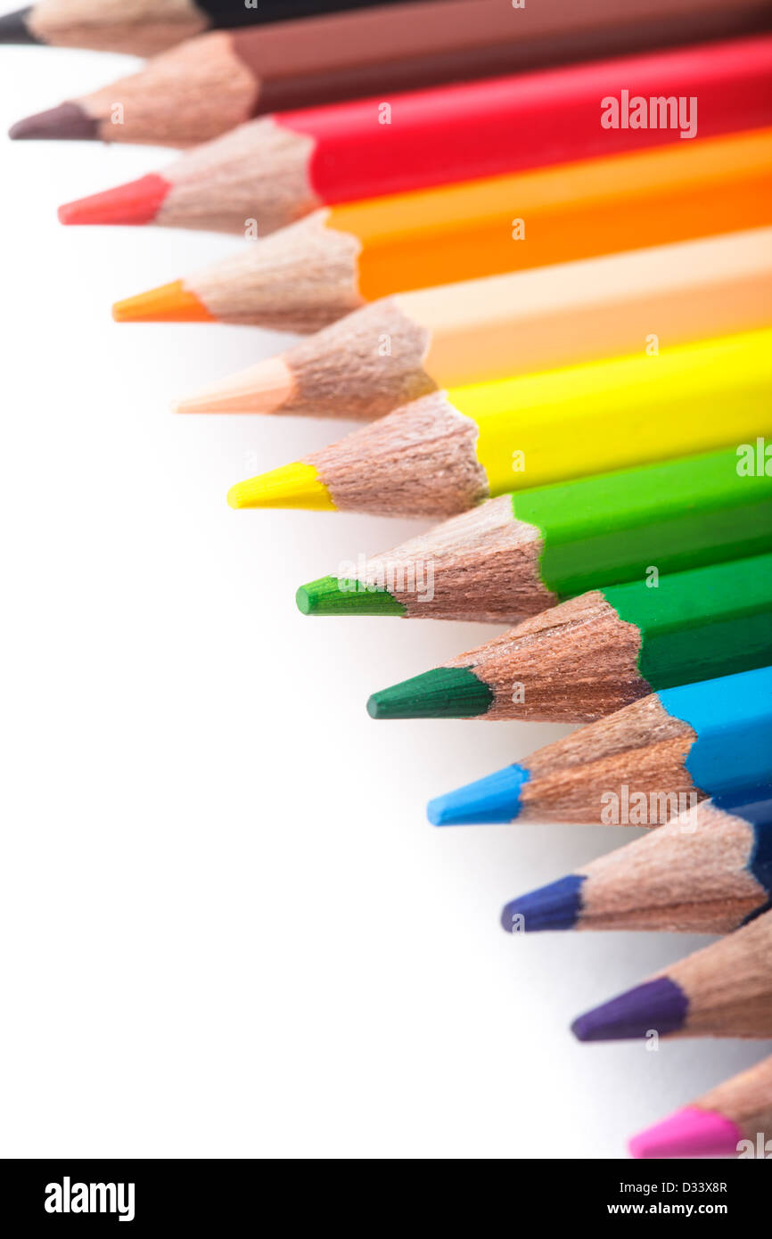 Rainbow color pencils in a row isolated on white Stock Photo - Alamy