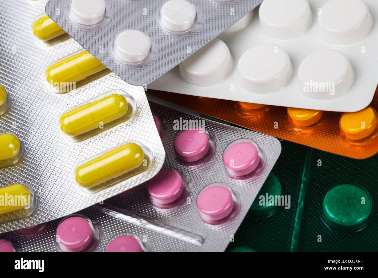 A variety of tablets in packs on background, treatment Stock Photo - Alamy