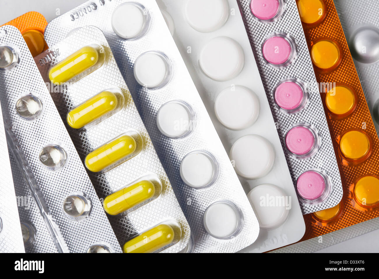 A variety of tablets in packs on background, treatment Stock Photo - Alamy