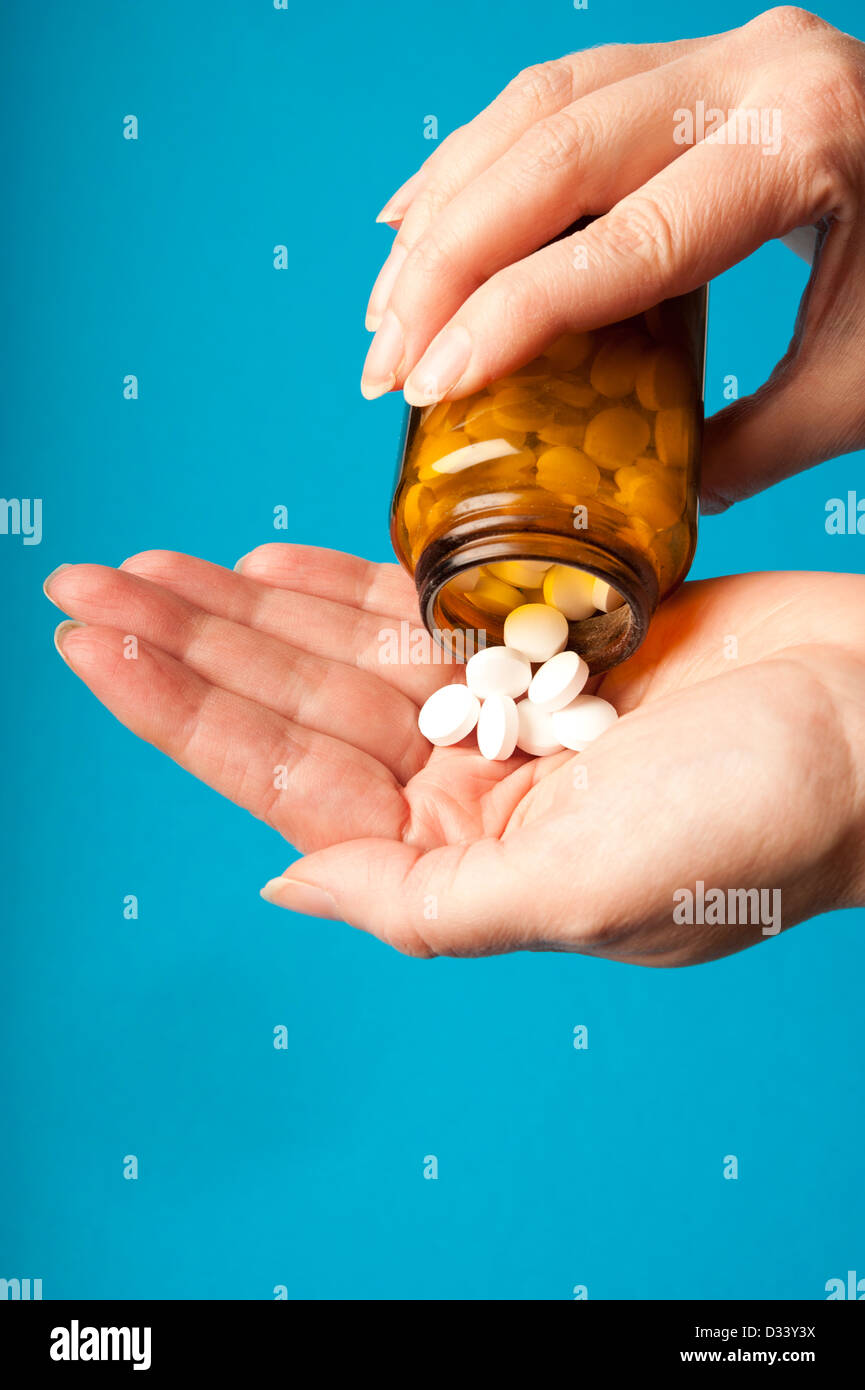 Medicine in hand hi-res stock photography and images - Alamy