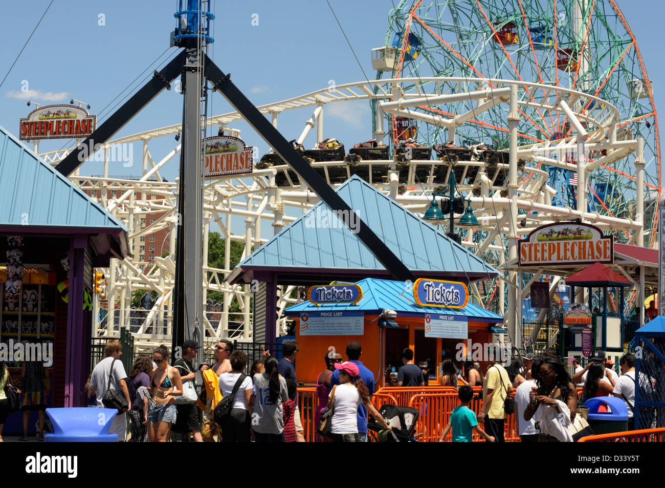 People enjoy the exuberance of the thrill of the fun fair rides at ...