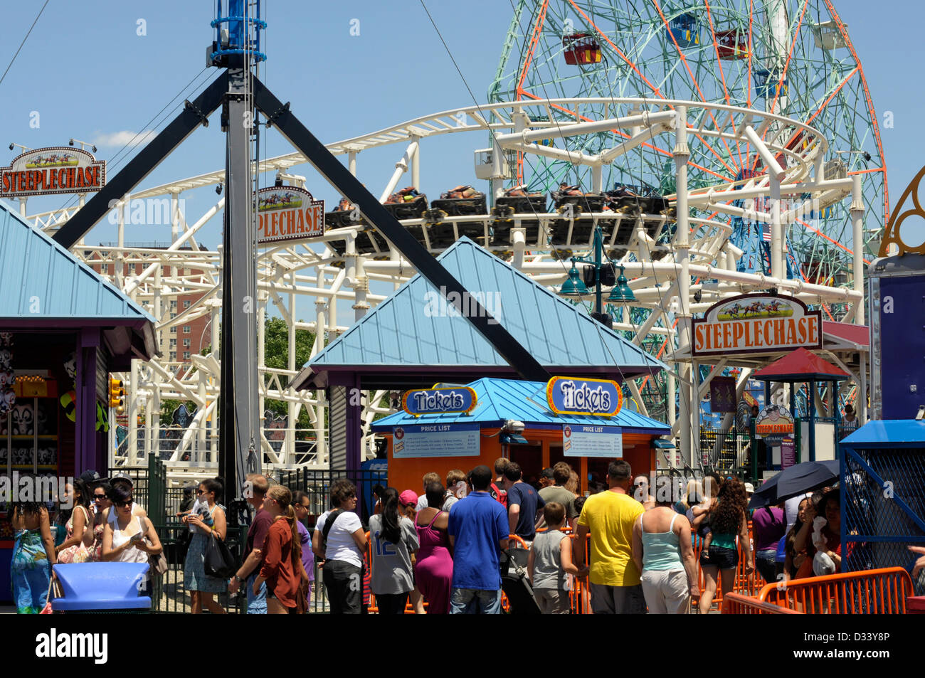 People enjoy the exuberance of the thrill of the fun fair rides at ...