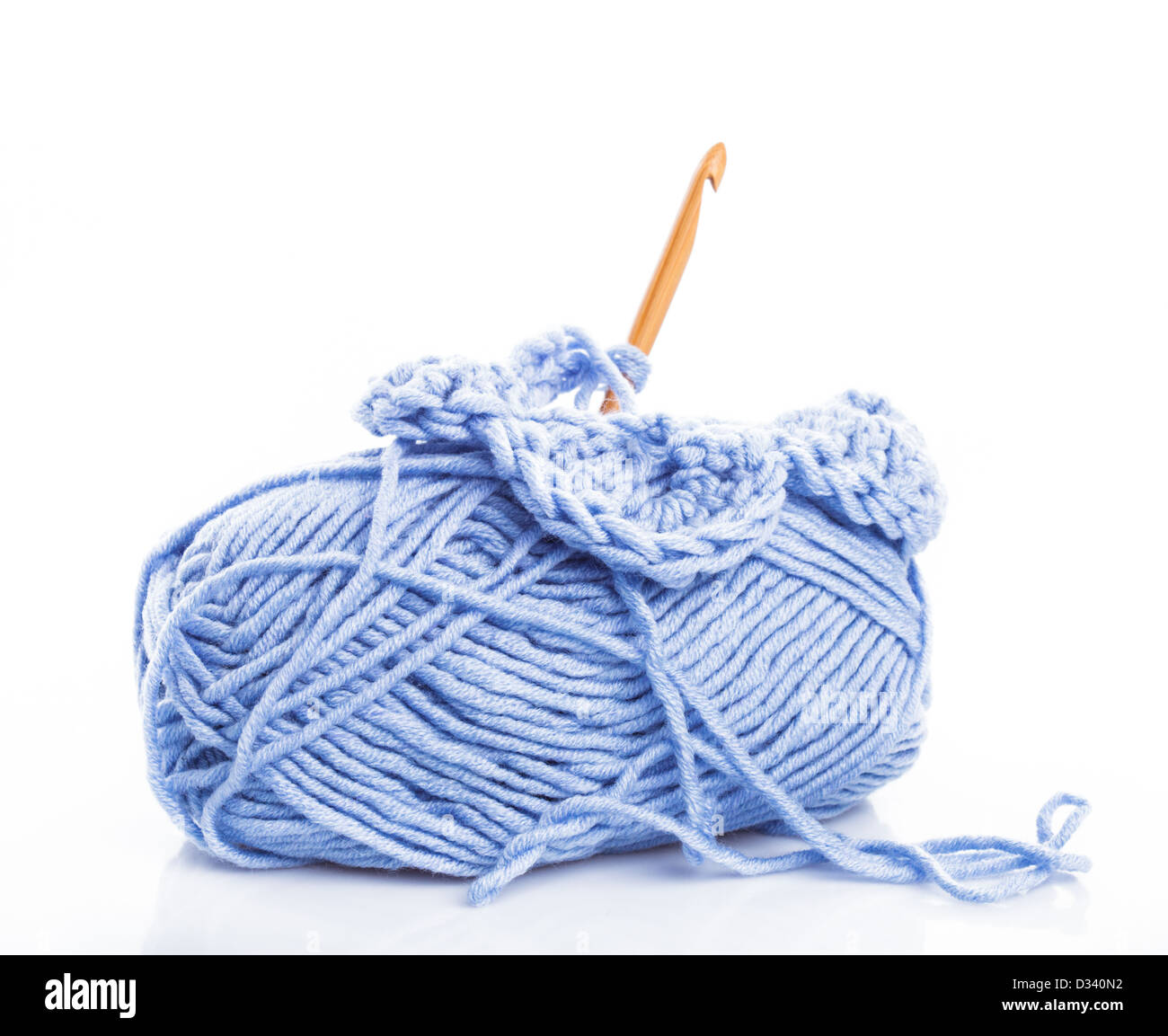 Crocheting with blue threads isolated on white Stock Photo - Alamy