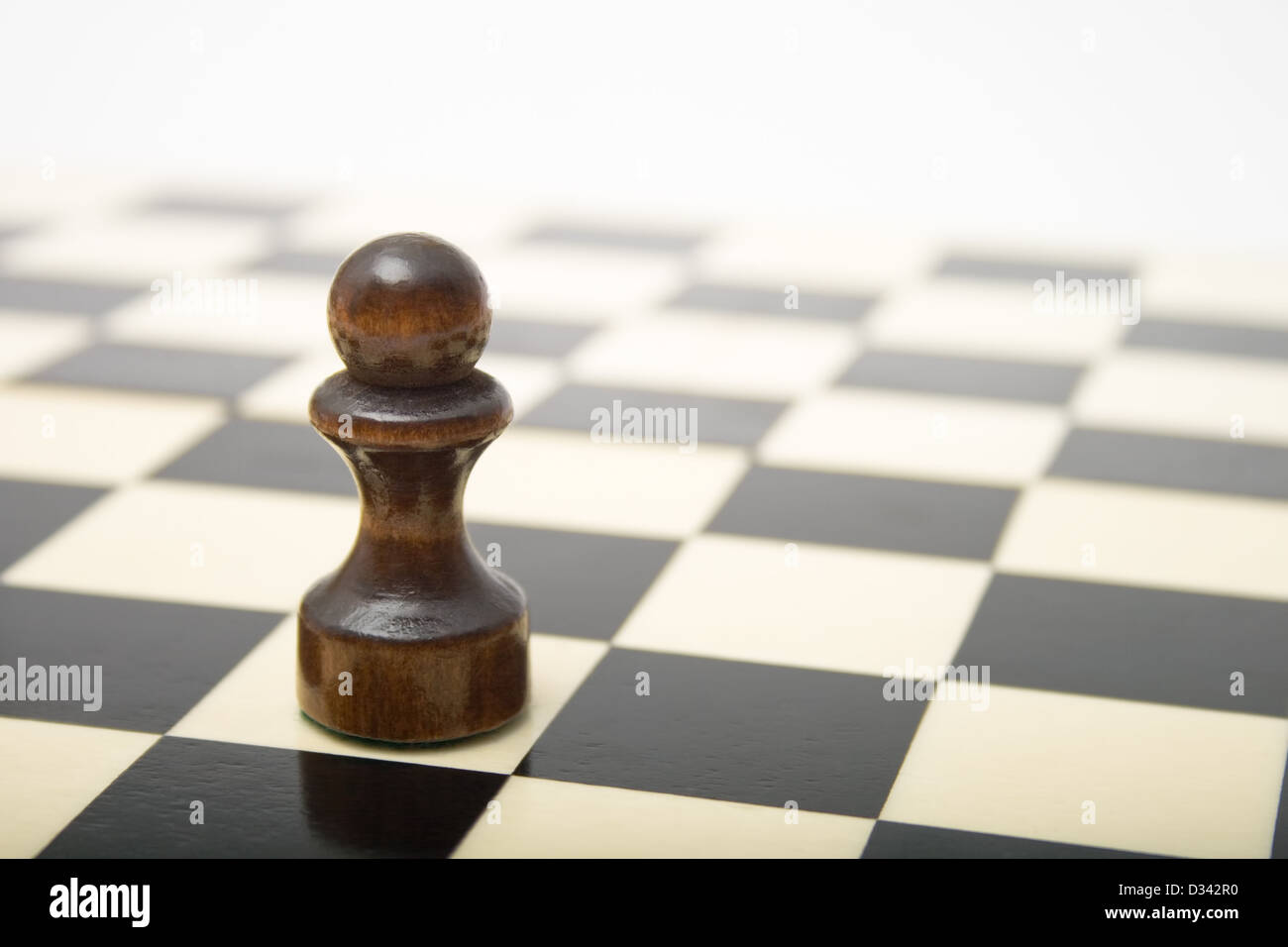 Black Pawn on a chess board Stock Photo - Alamy