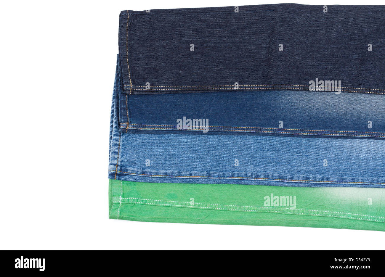 The legs of four different pairs of jeans overlaid to display the ...