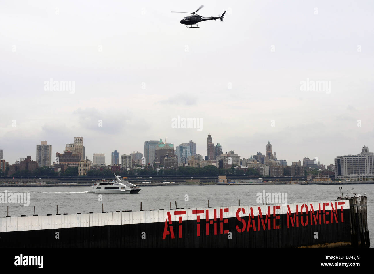 Helicopter arrival at the Downtown Manhattan Heliport with Brooklyn in ...