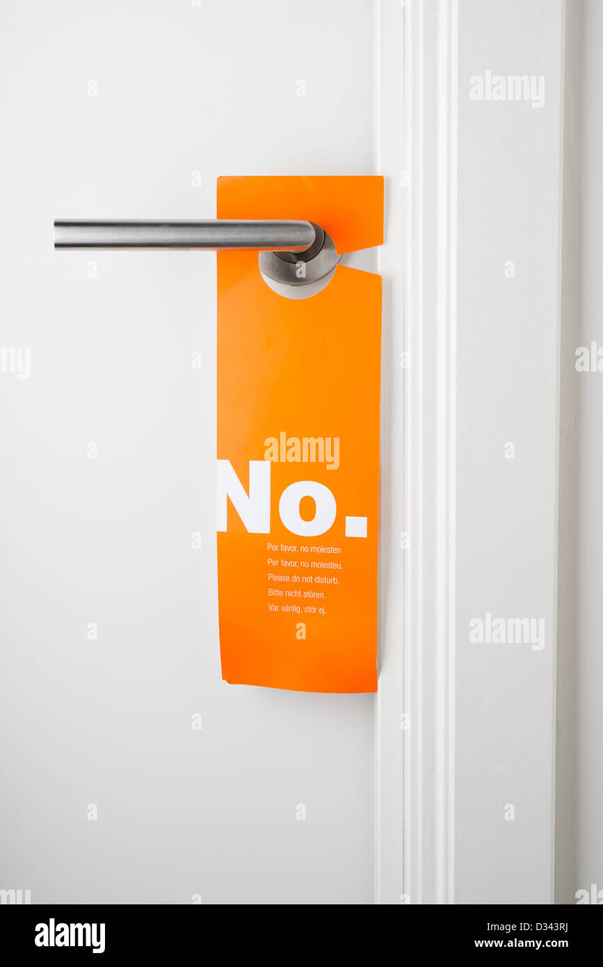 Do not disturb sign on hotel door Stock Photo - Alamy
