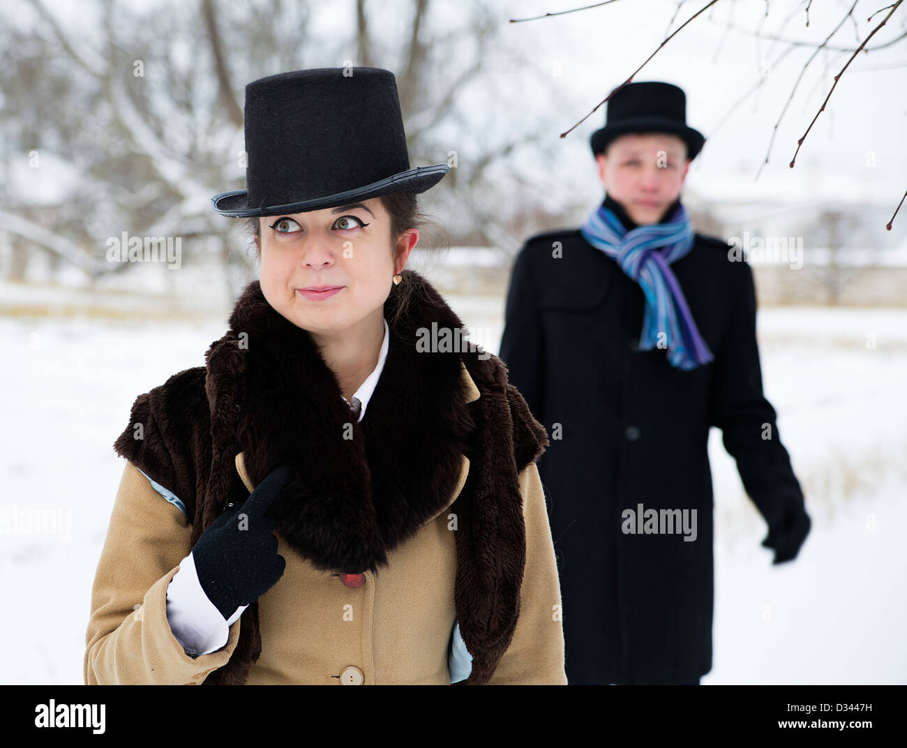 Man walk behind woman who make some thoughts Stock Photo - Alamy
