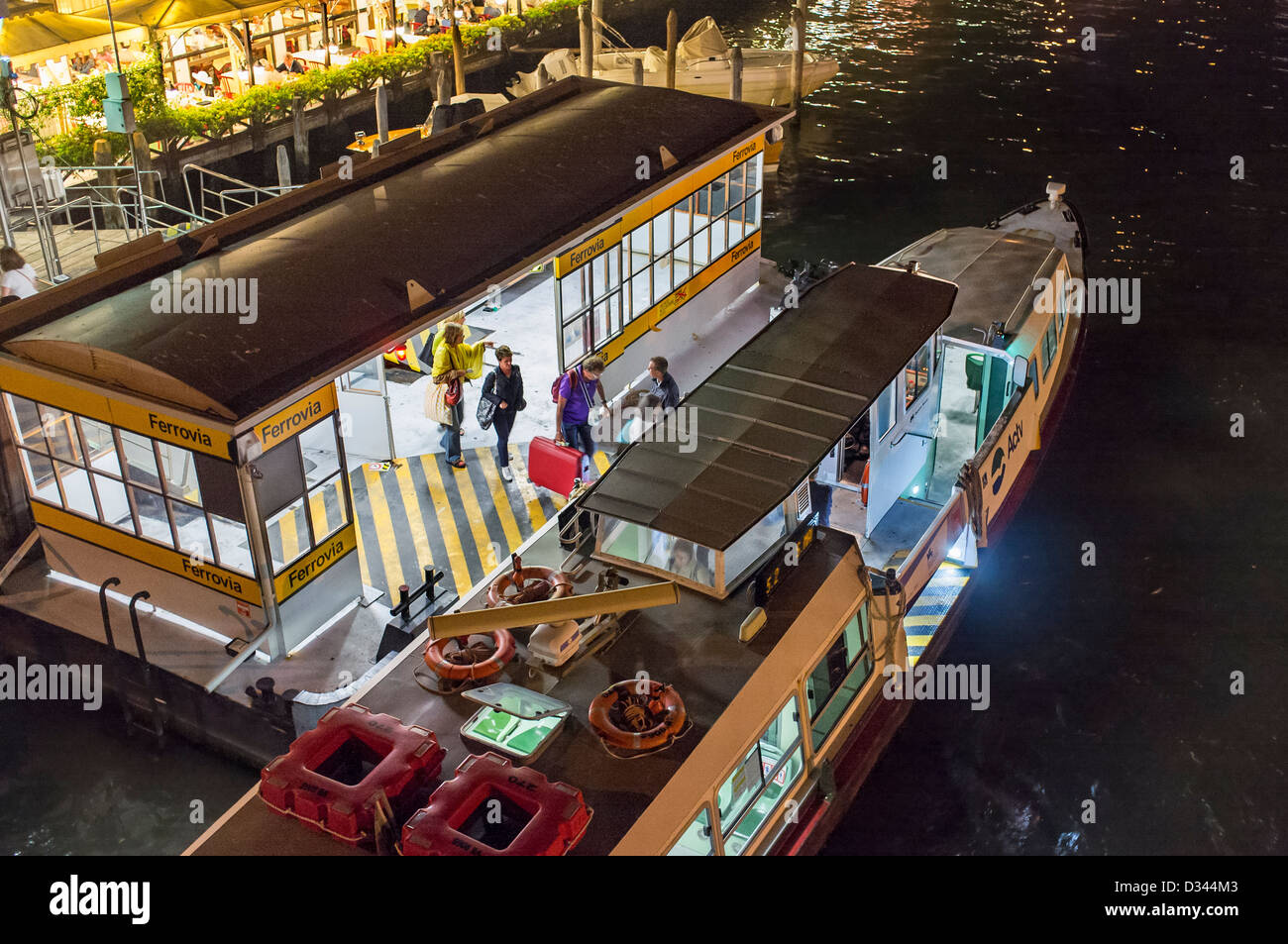 Water Bus Stop on the Grand Canal Venice at Night Stock Photo - Alamy