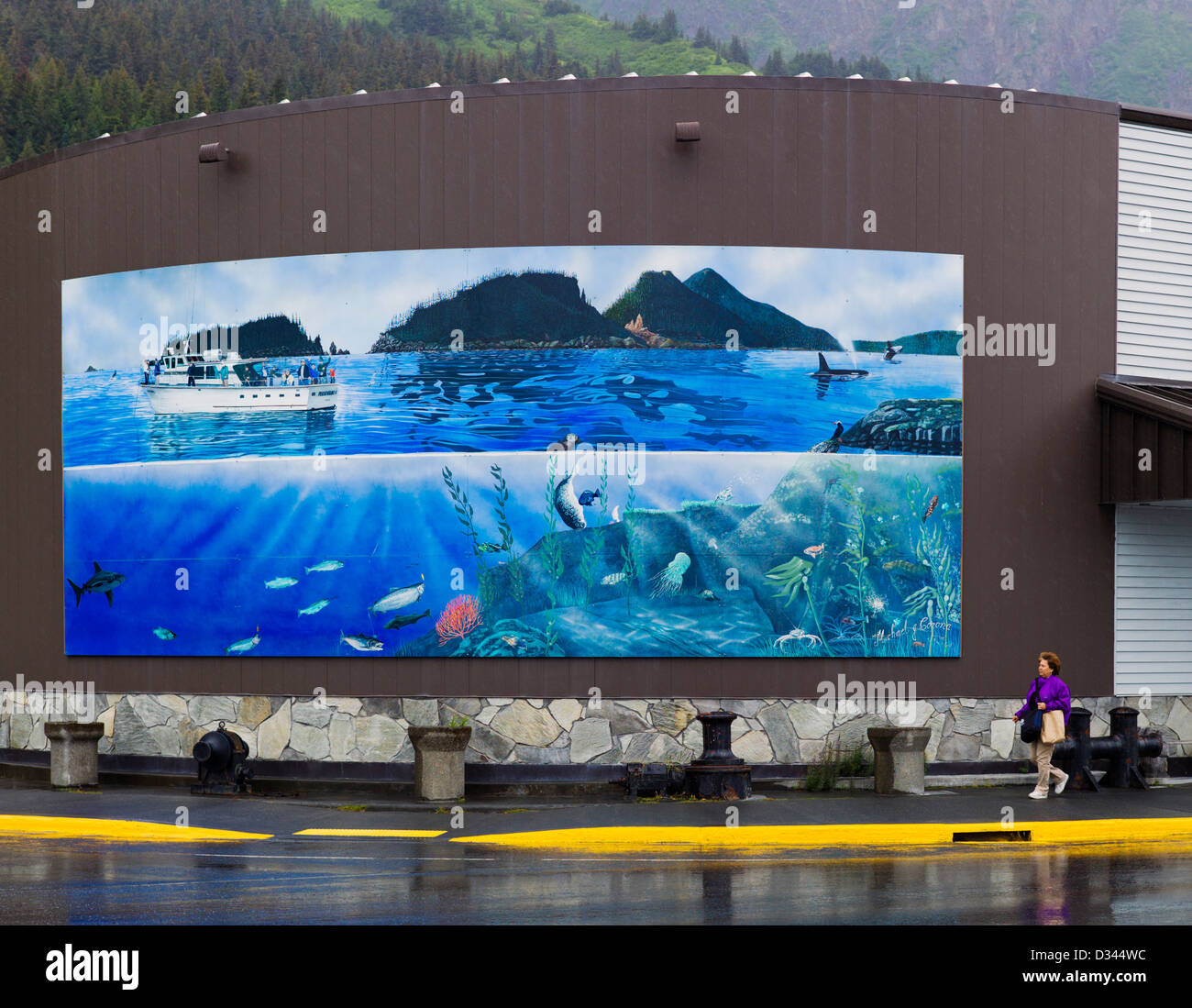 Large colorful mural in the seaside harbor village of Seward, Alaska ...