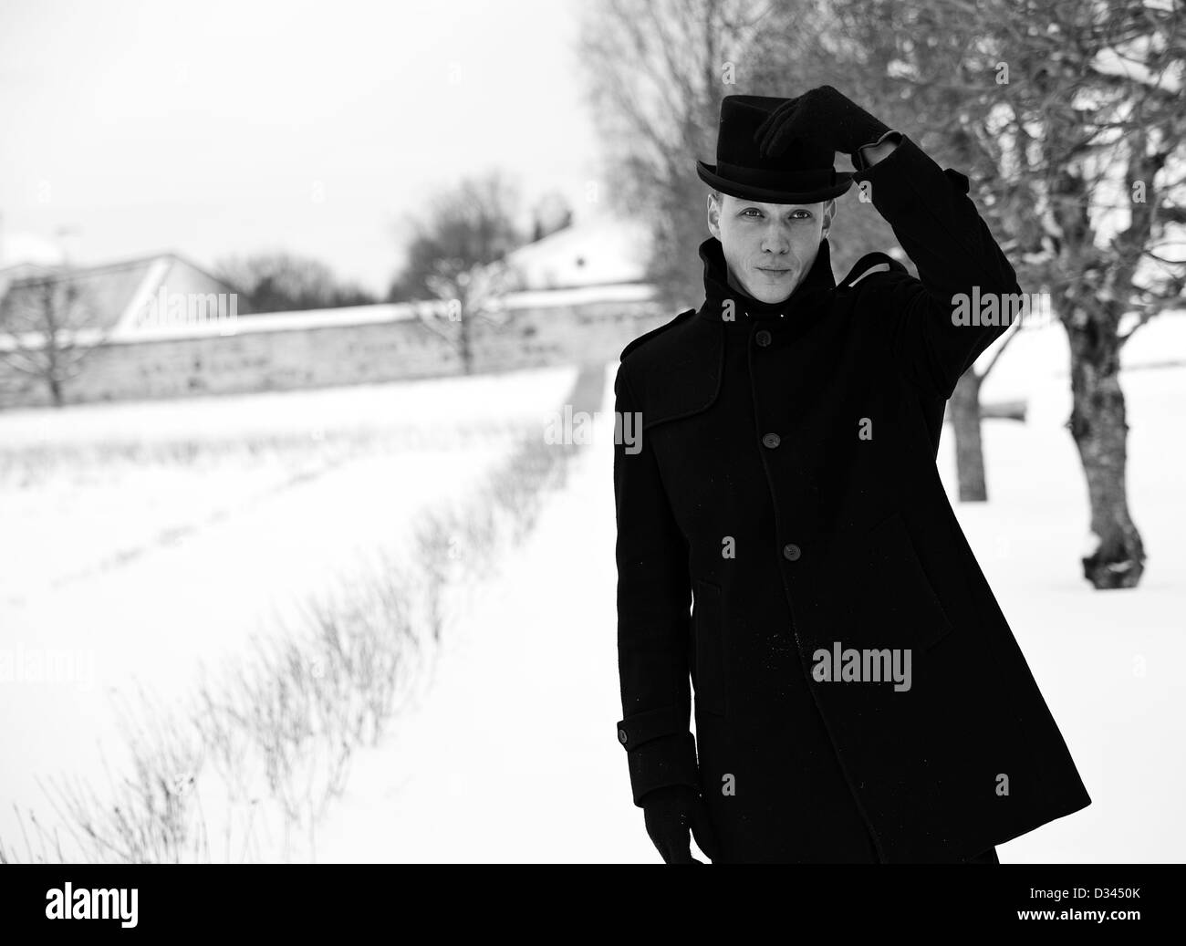 Man hat on head Black and White Stock Photos & Images - Alamy
