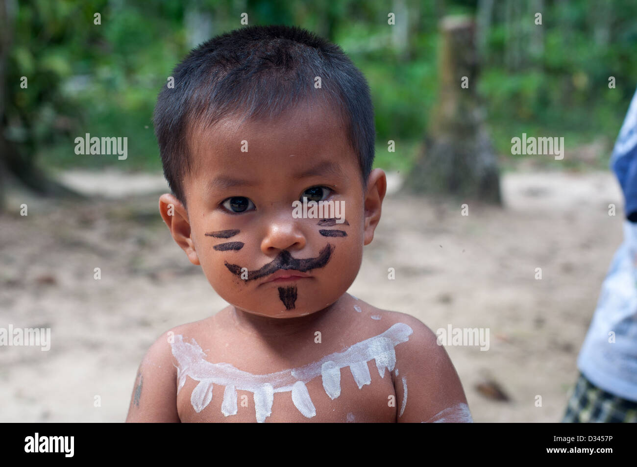 A Bora child with traditional body decoration painting, Puca Urquillo ...
