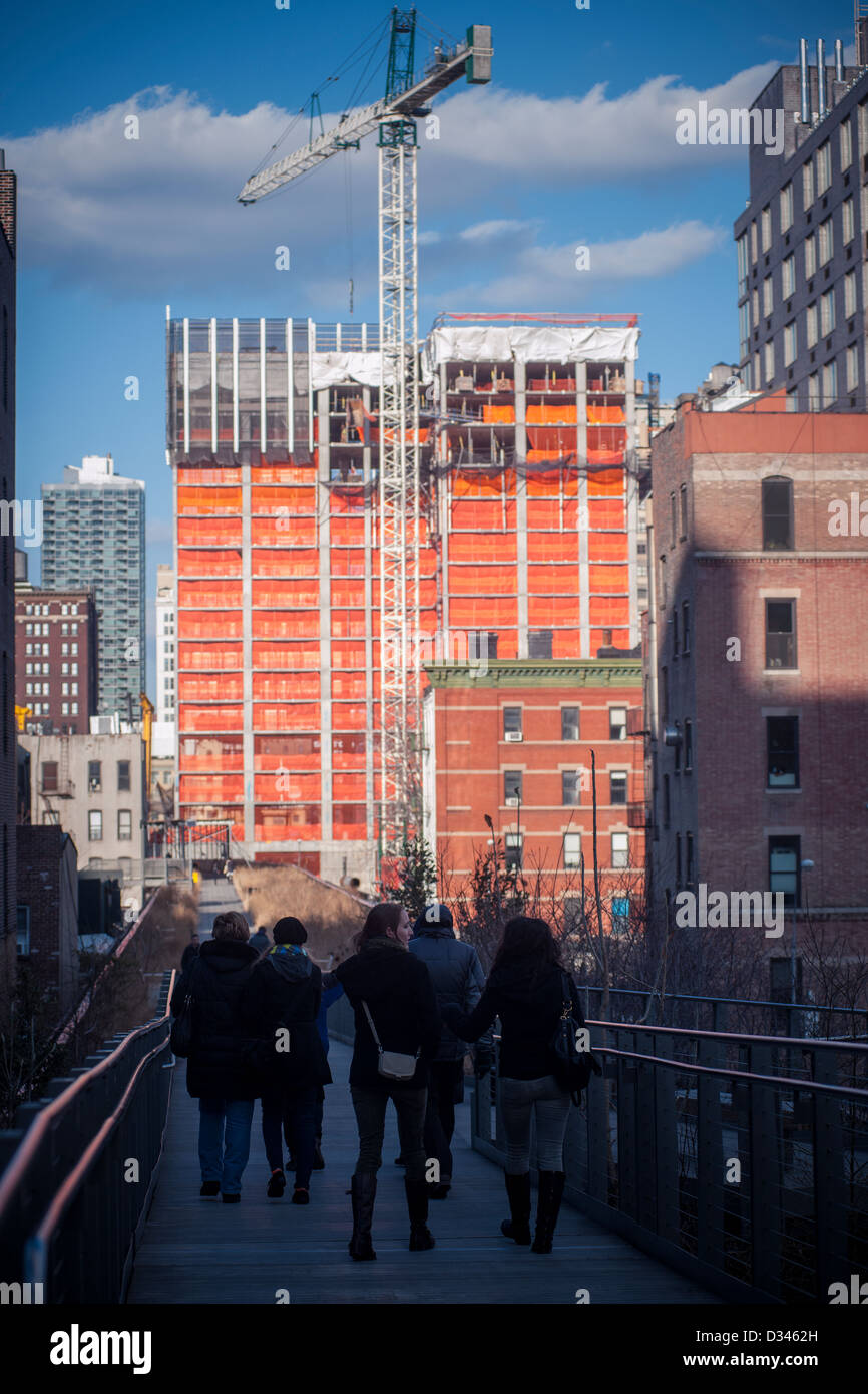 New construction rises along the High Line Park in the West Chelsea ...