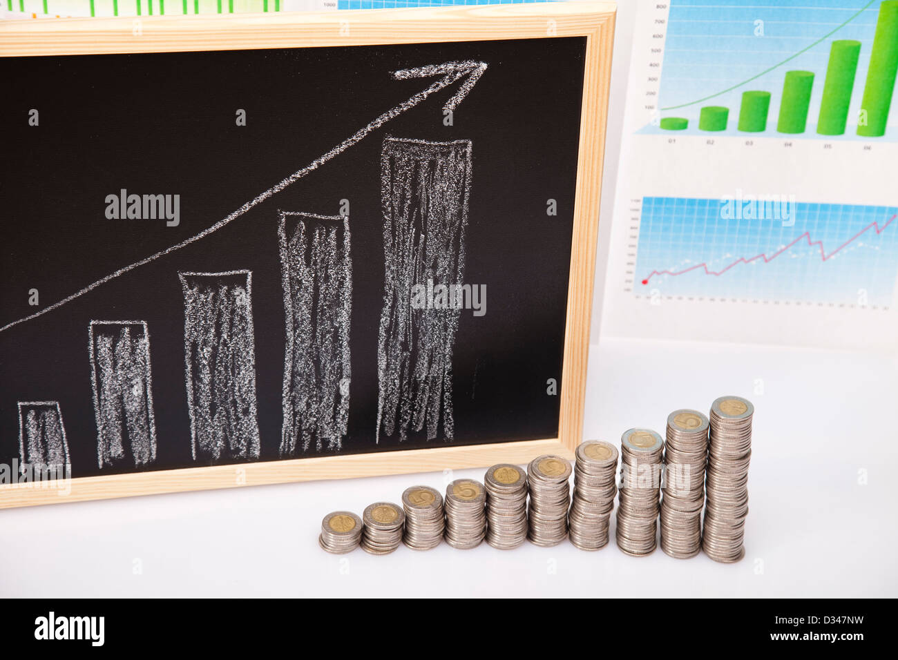 Financial success concept, Coins diagram Stock Photo - Alamy