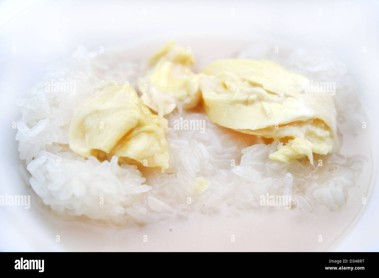 Thai dessert , Sticky rice with durian in coconut milk Stock Photo - Alamy