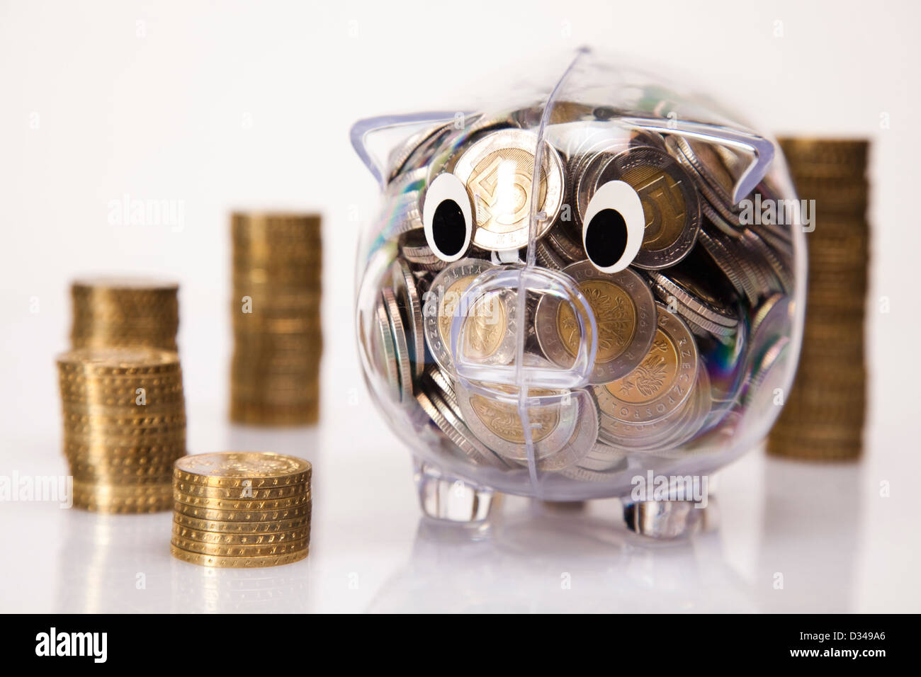 Pig bank and money coin Stock Photo - Alamy
