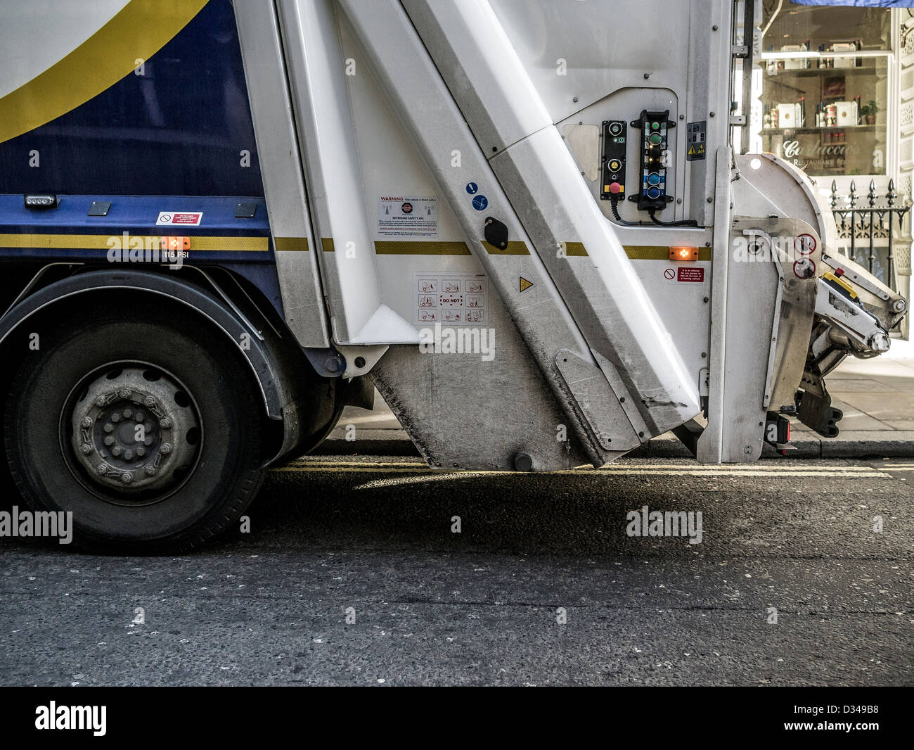 Rear end side view of a Rubbish Collection garbage truck vehicle ...