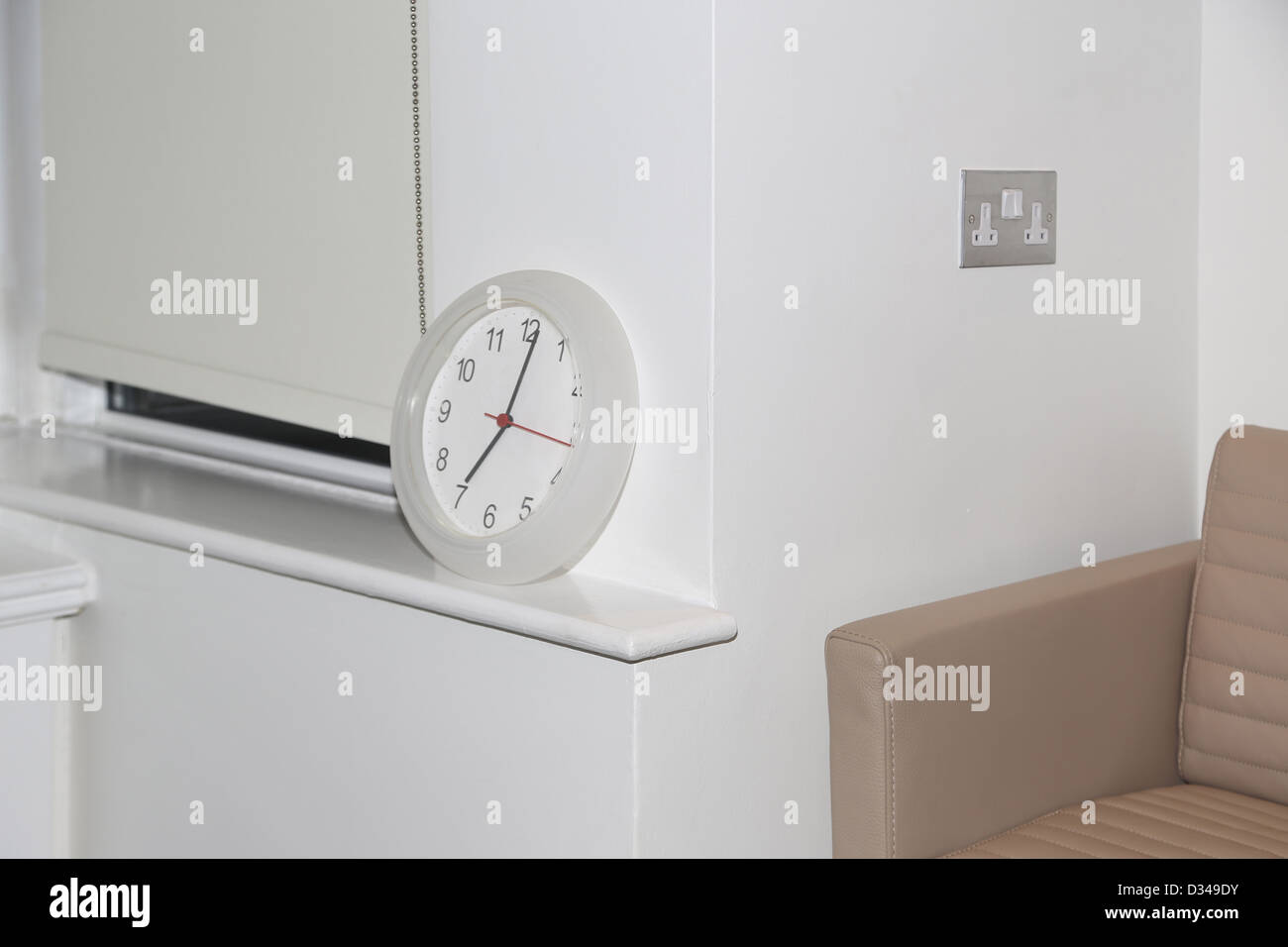 Clock in Corner Of A Private Hospital Room England Stock Photo - Alamy