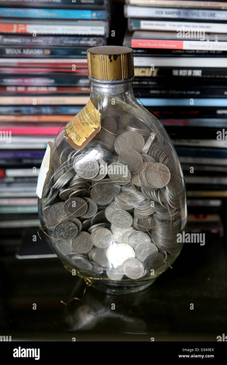 Old Money In A Bottle By Cds Stock Photo - Alamy