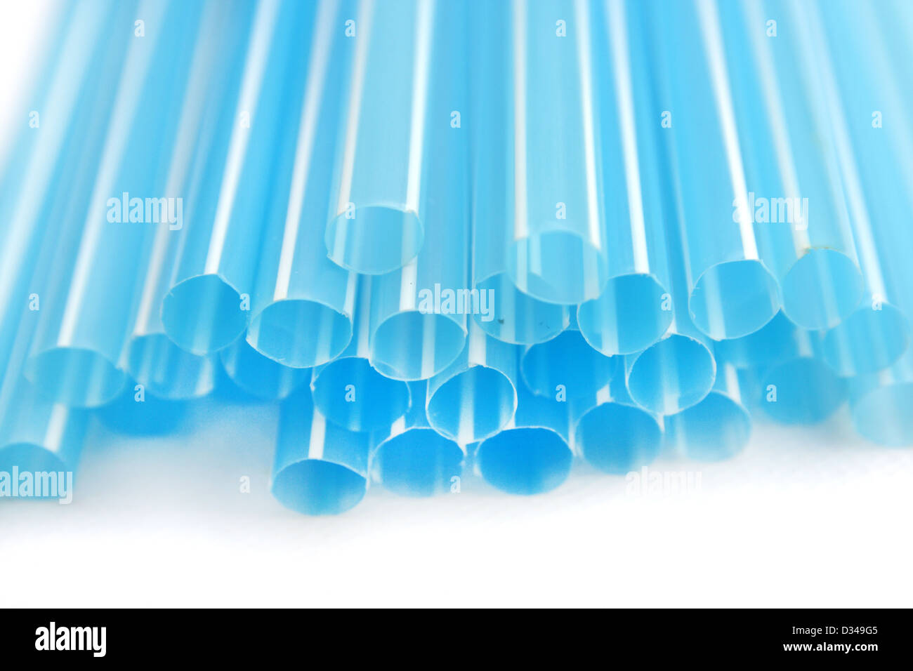 Blue plastic straws Stock Photo - Alamy