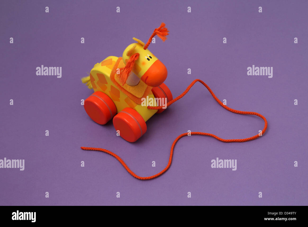 Wooden Giraffe With Wheels A Pull Along Toy Stock Photo - Alamy