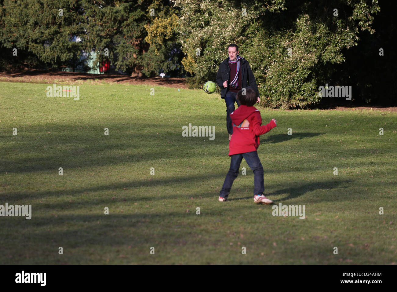 Uncle And Nephew Playing Football At the Pittville Pump Room Pleasure ...