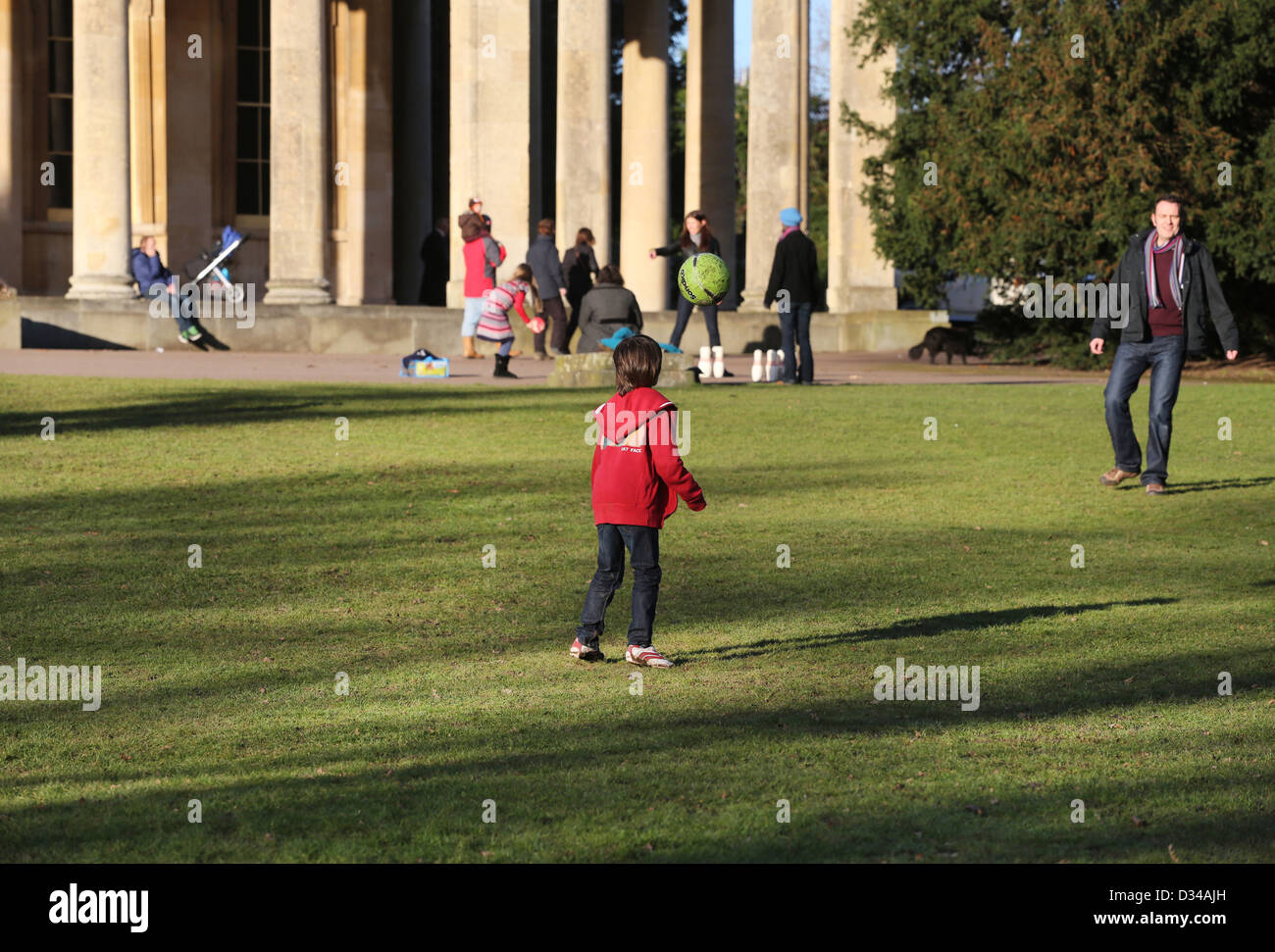 Uncle And Nephew Playing Football At the Pittville Pump Room Pleasure ...