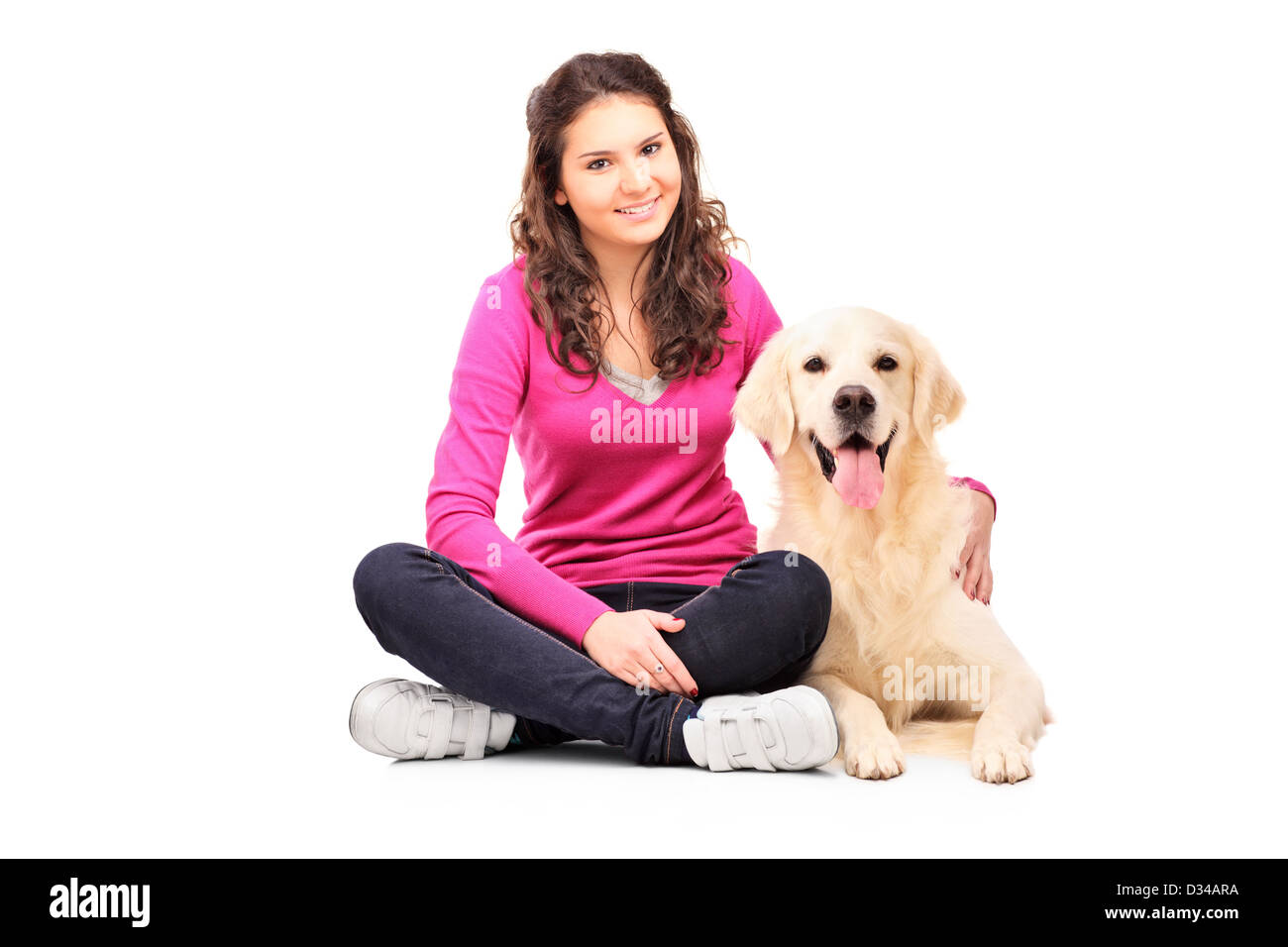 Young female posing with a labrador retriever isolated on white ...