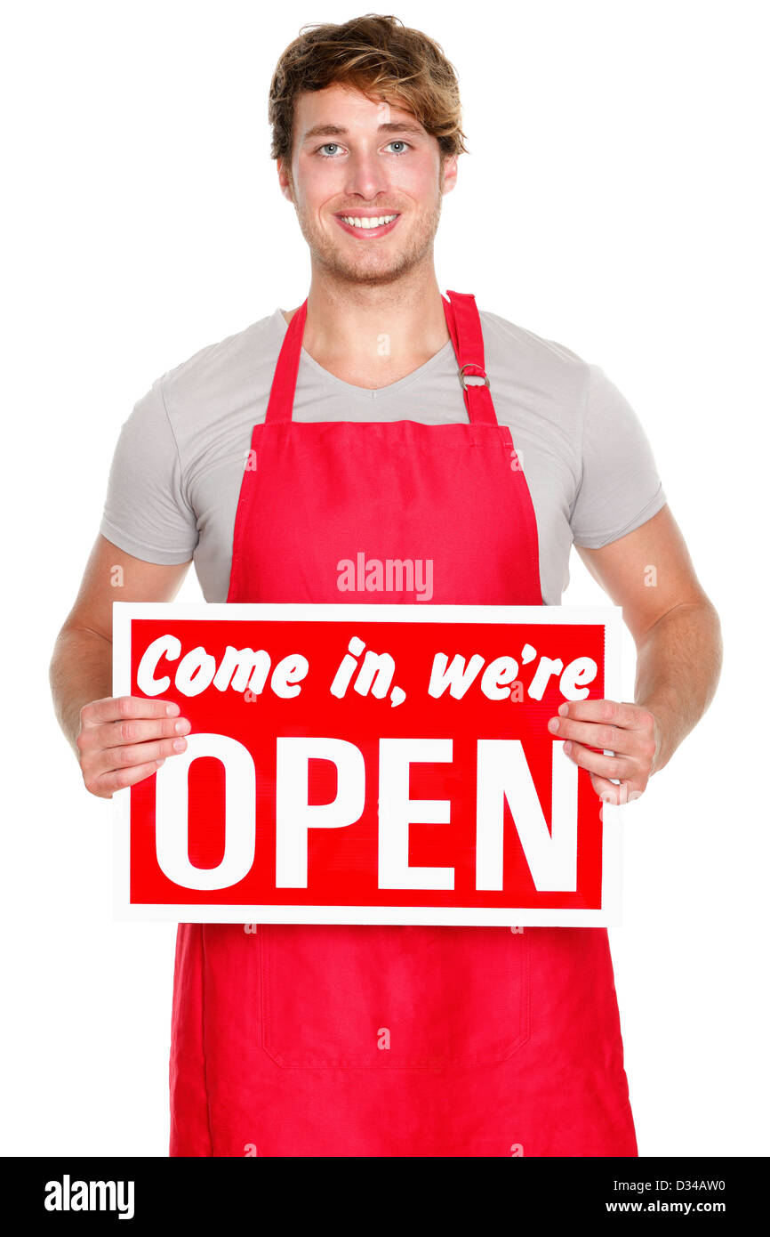 Portrait of smiling Caucasian male business owner / employee in red ...