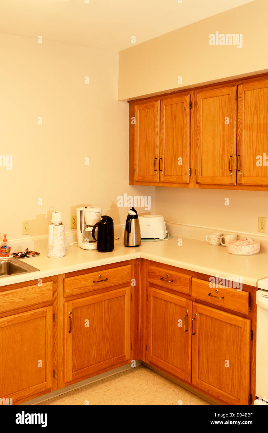 Large kitchen with wood cabinets Stock Photo - Alamy