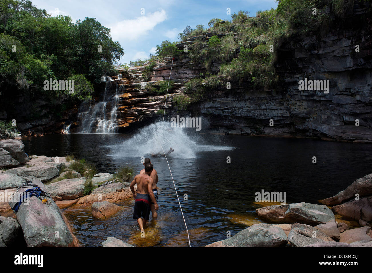 zip lining and finishing up in the water Stock Photo - Alamy